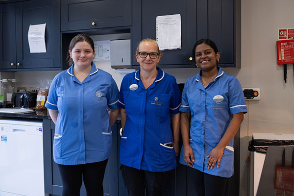 This is the reason why some care home staff wear purple uniforms - Care ...